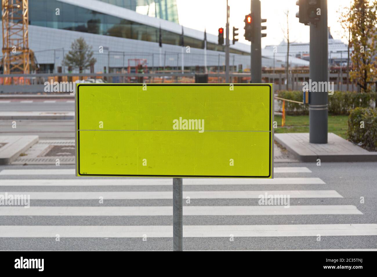 Big Yellow Caution SIgn Board at Street Crossing Stock Photo - Alamy