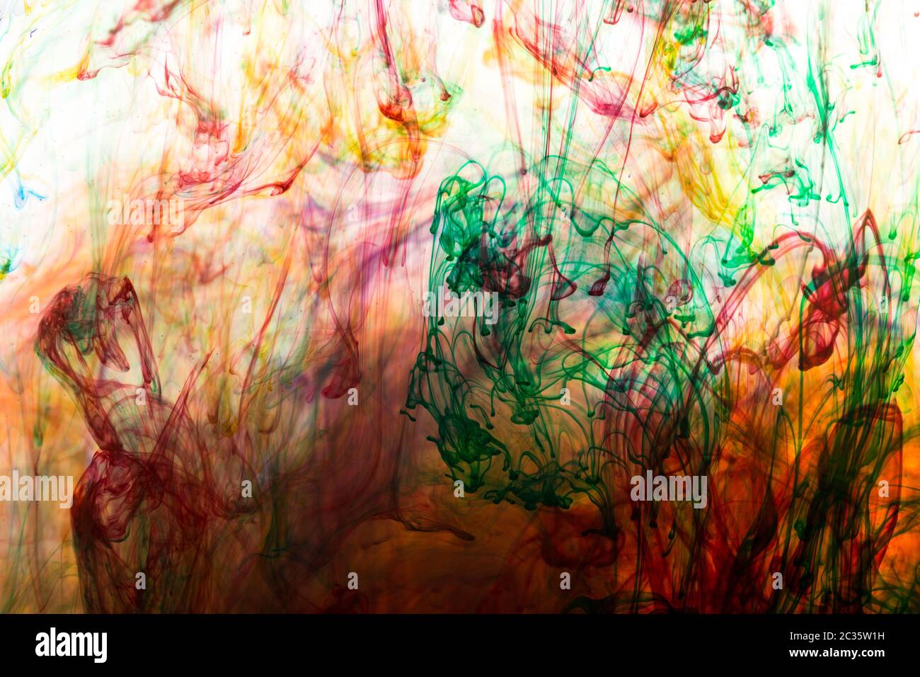 Acrylic colors and ink in water. Abstract background Stock Photo - Alamy