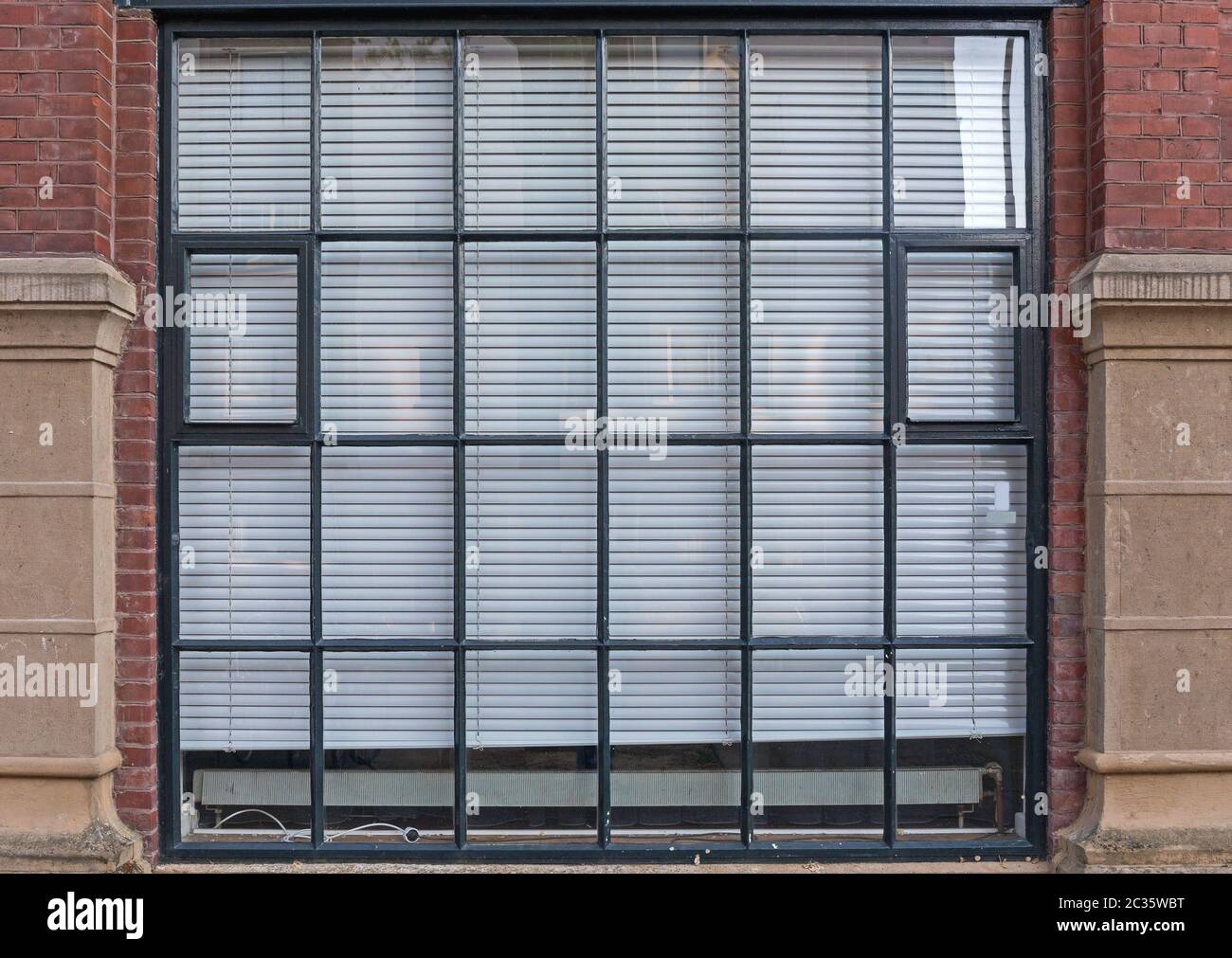 Big Glass Wall Window With Aluminium Blinds Stock Photo - Alamy