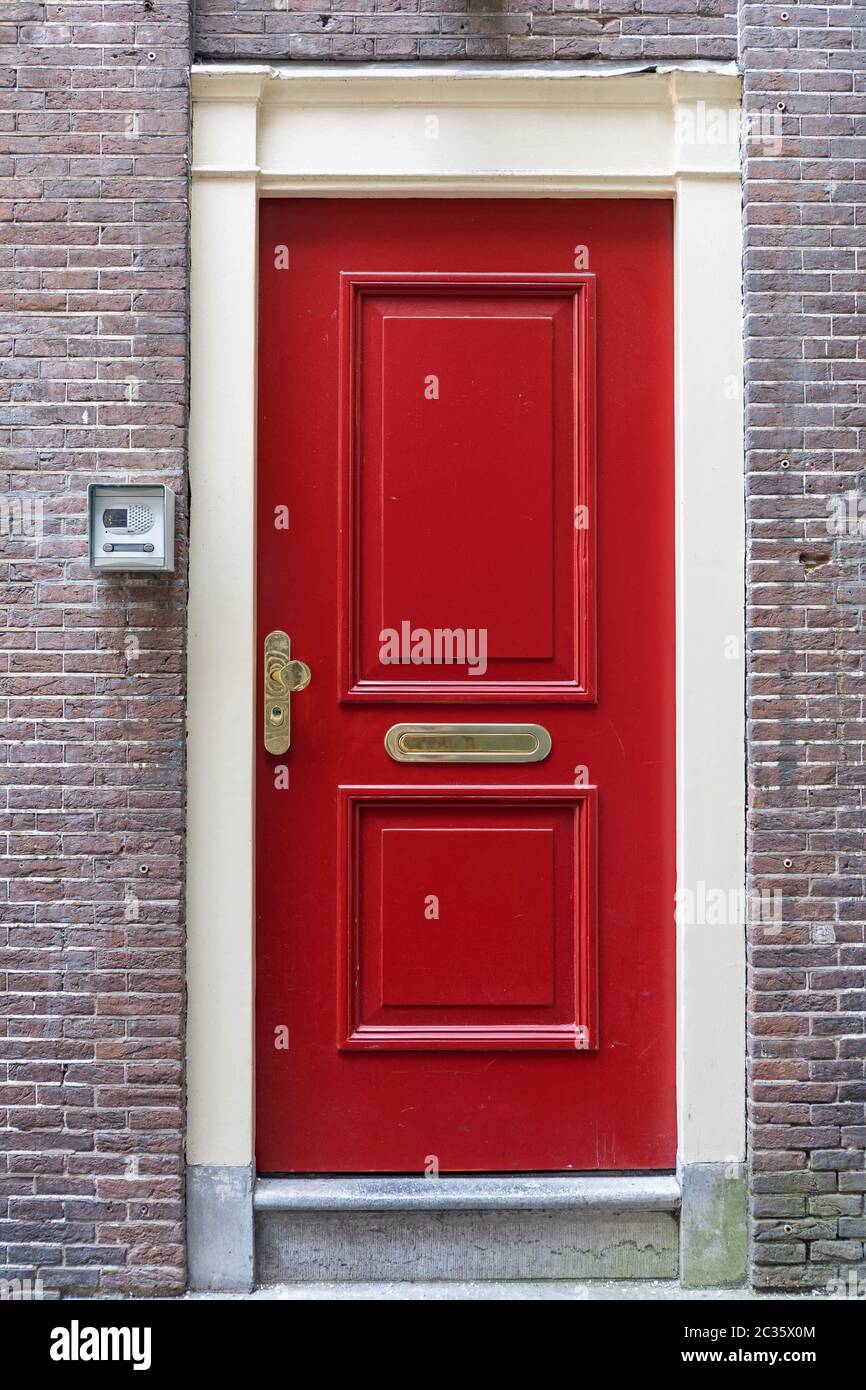 Closed Red Door at House in Amsterdam Stock Photo - Alamy