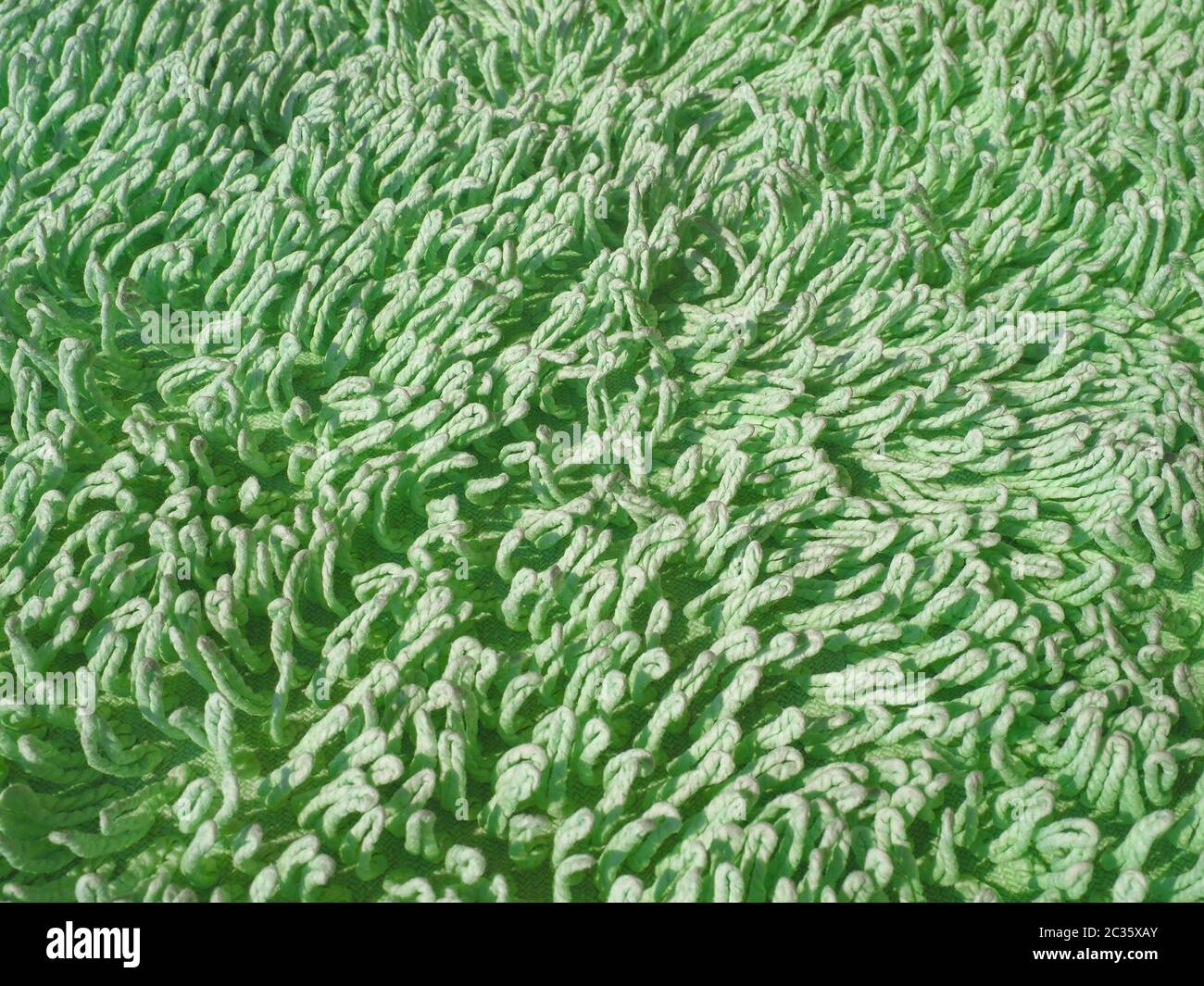 green carpet texture useful as a background Stock Photo - Alamy