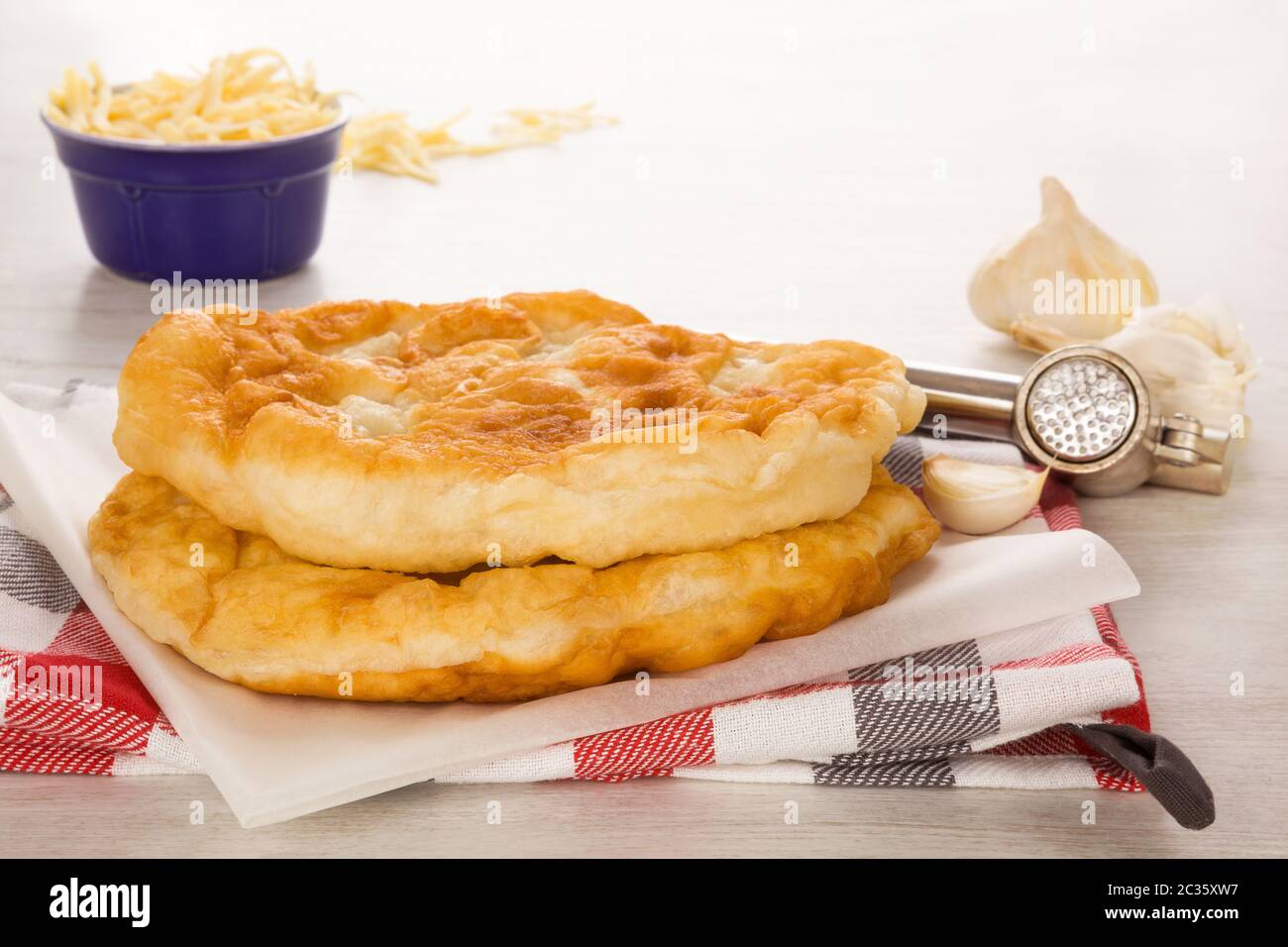 Langos typical Hungarian dish Stock Photo - Alamy