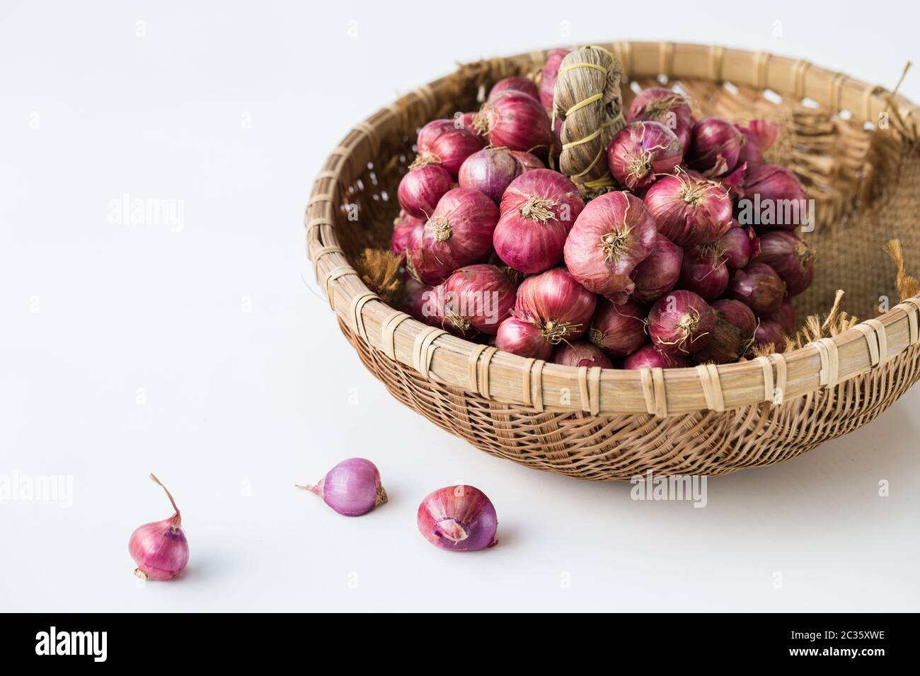 Fresh shallots-Red onions on the white background Stock Photo - Alamy