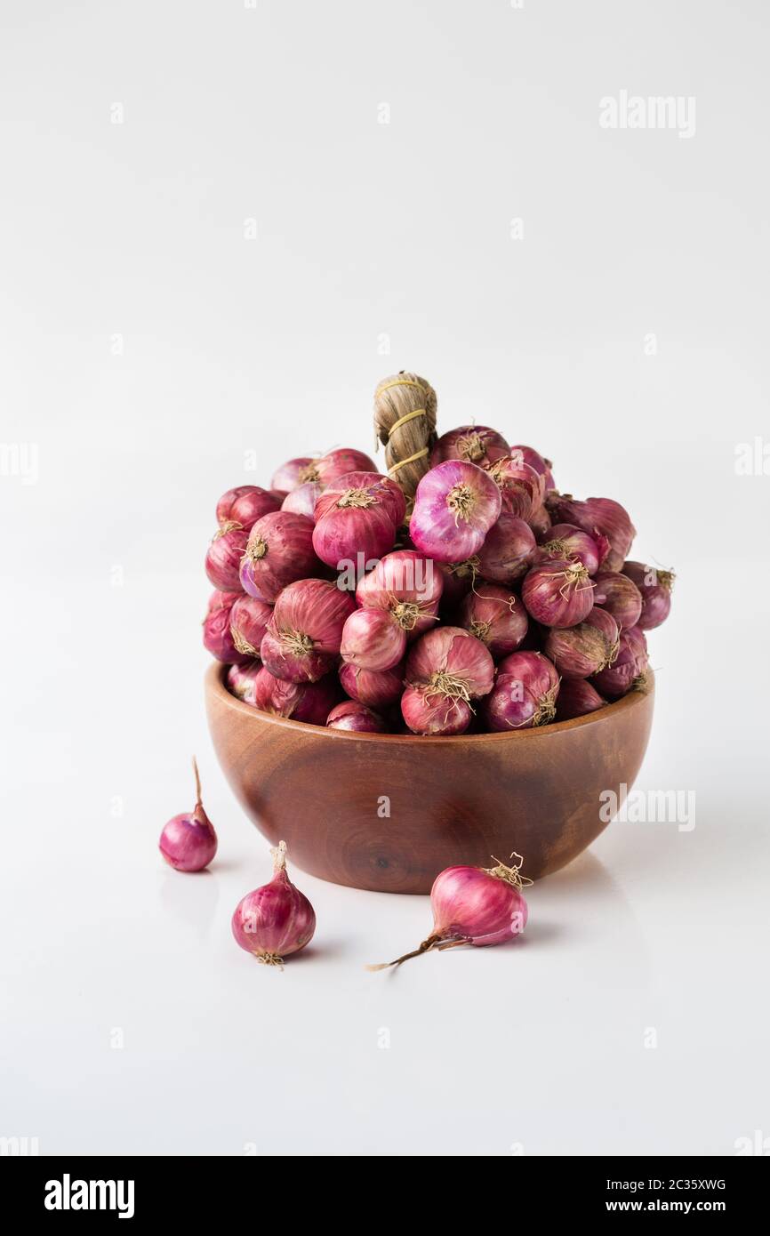 Fresh shallots-Red onions on the white background Stock Photo - Alamy