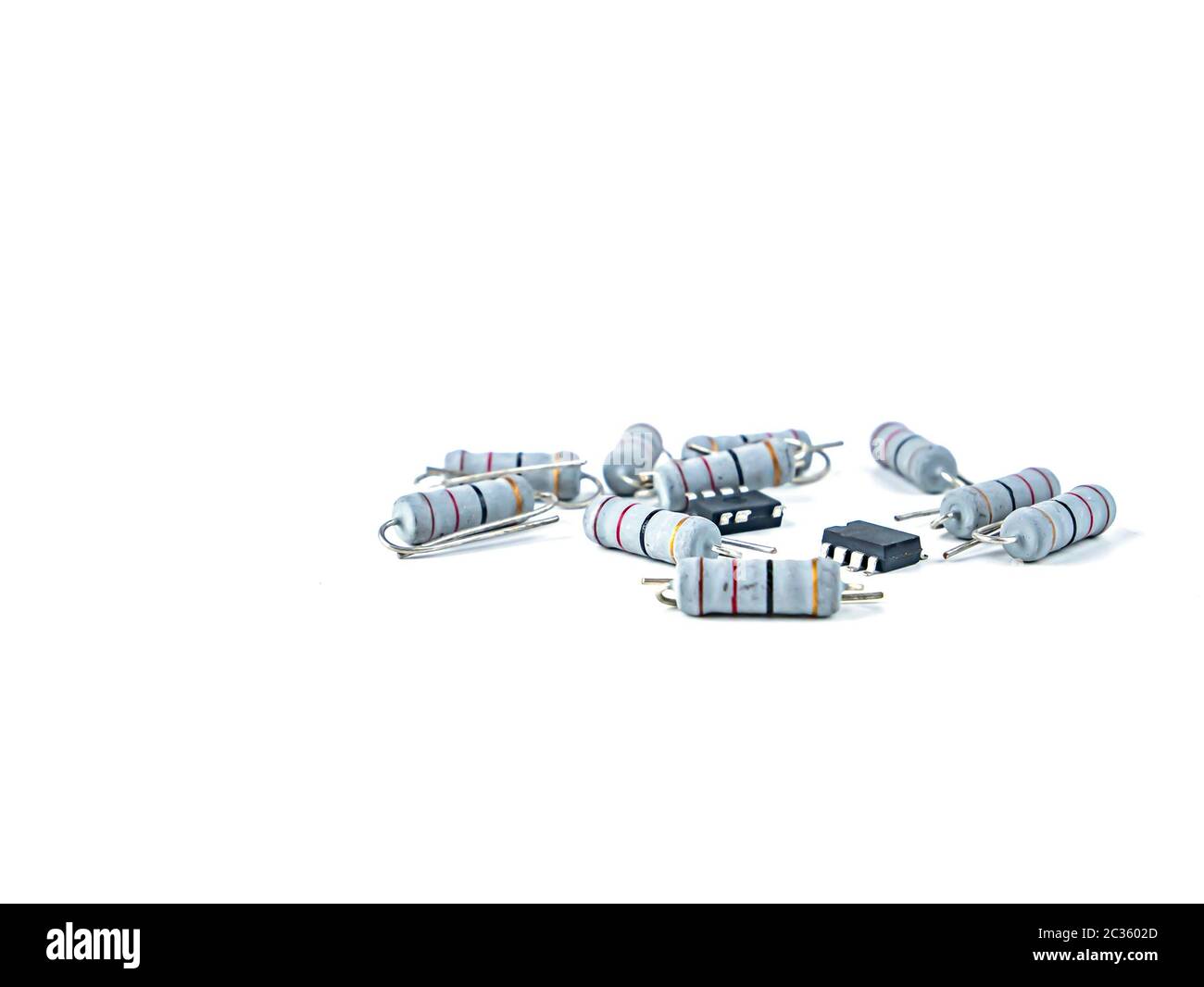 Electronic parts on a white background with place for text. Capacitor ...