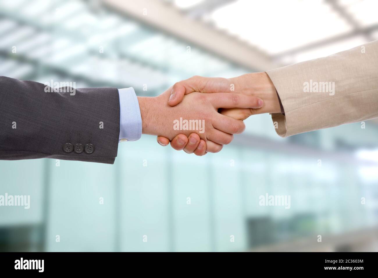Business men hand shake at the office Stock Photo - Alamy