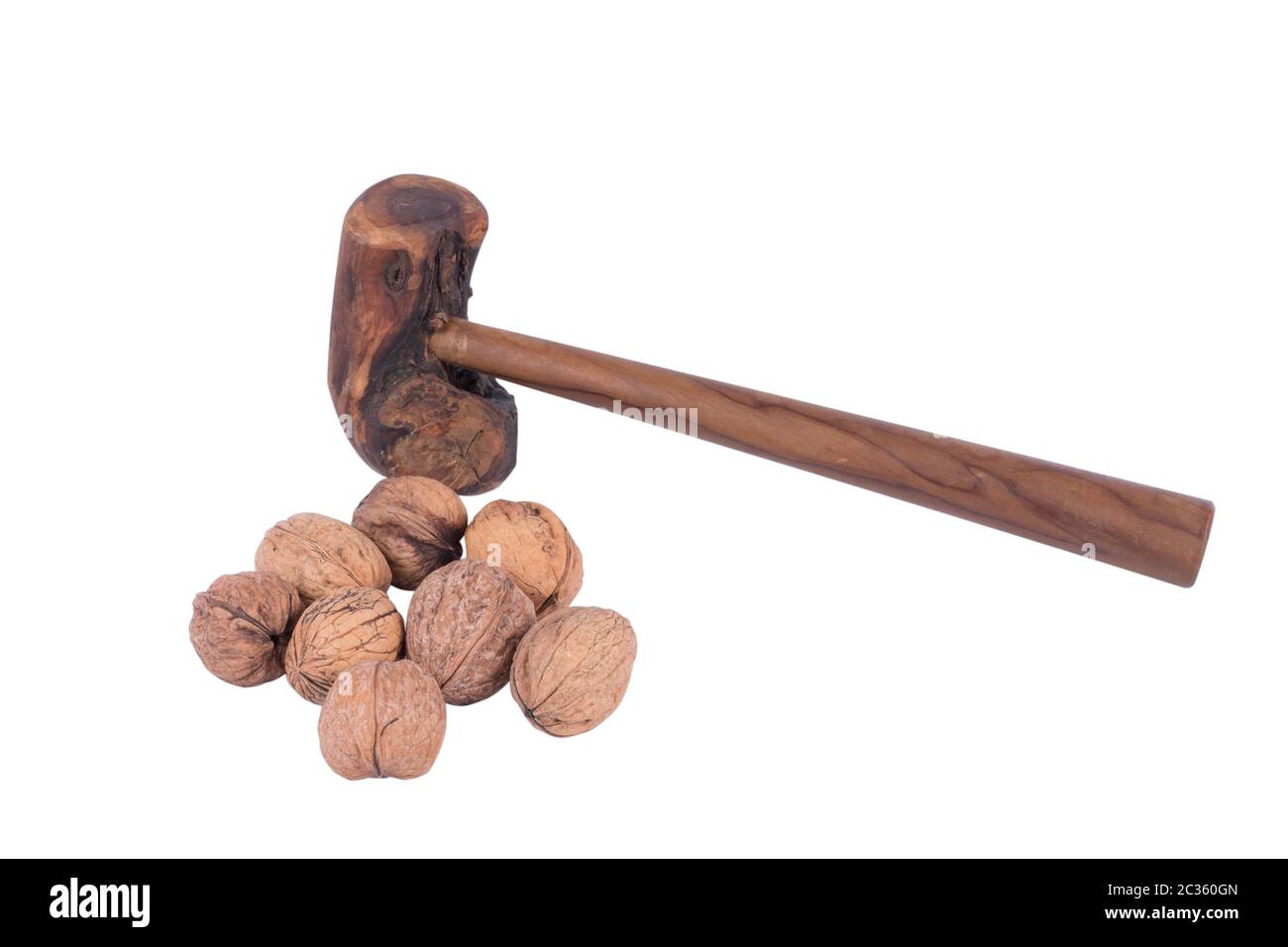 man breaking a walnut in a nutshell Stock Photo - Alamy