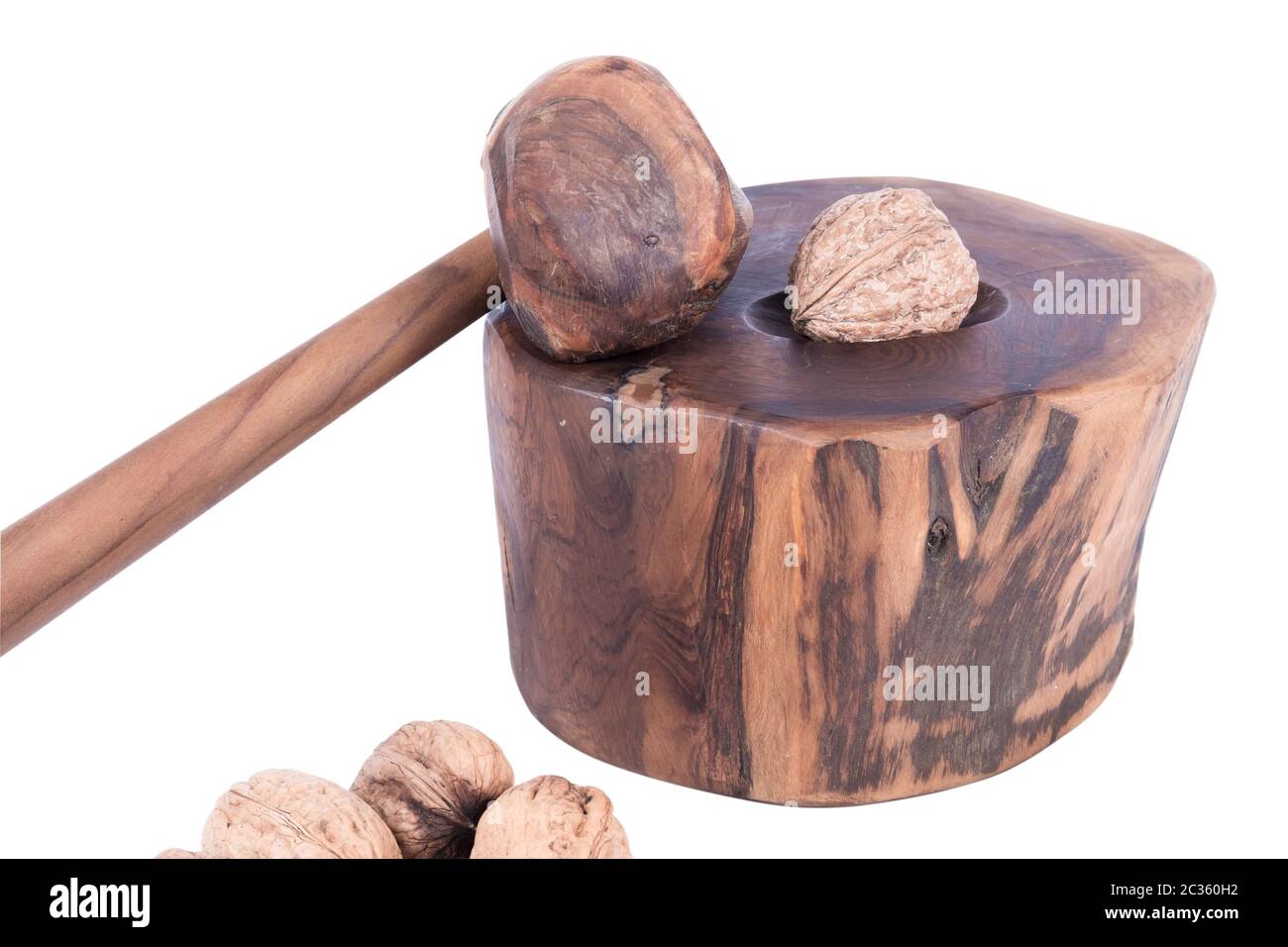 man breaking a walnut in a nutshell Stock Photo - Alamy