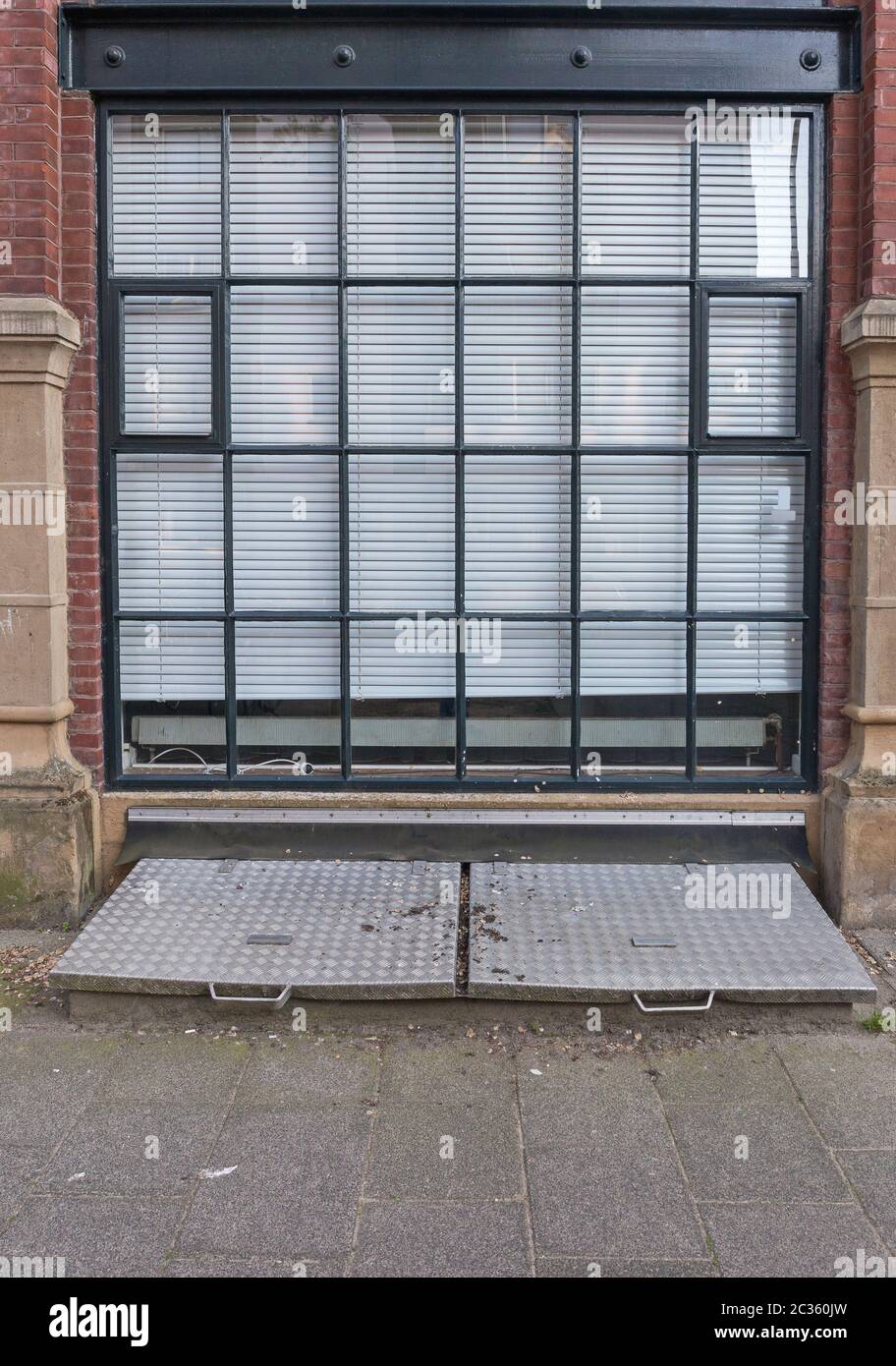 Big Glass Wall Window With Aluminium Blinds Stock Photo - Alamy