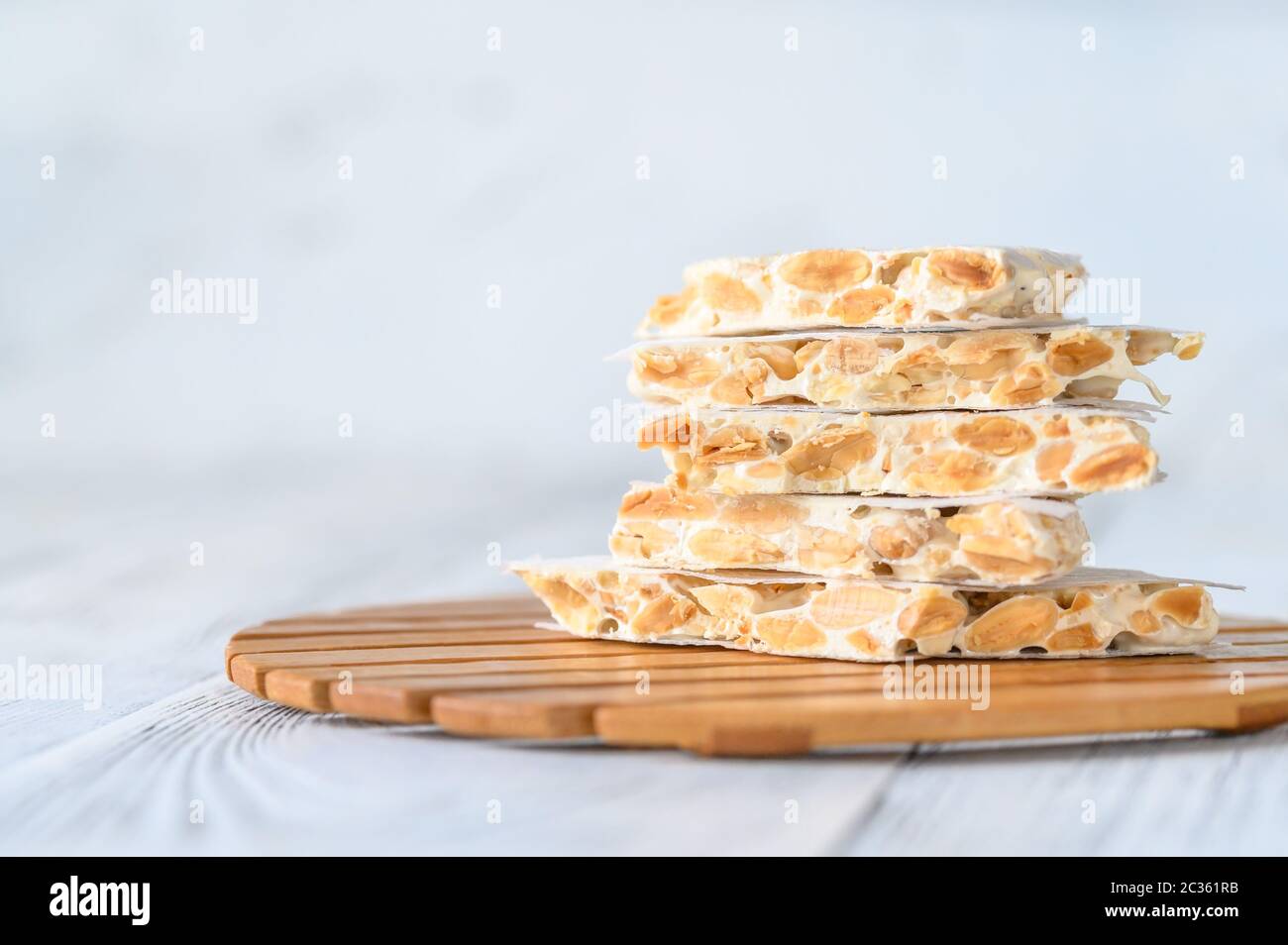 Bunch of spanish almond turron confection Stock Photo - Alamy