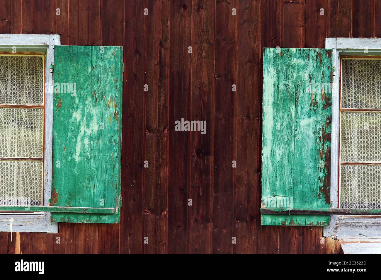 Windows with turquoise shutters on the house hi-res stock photography ...