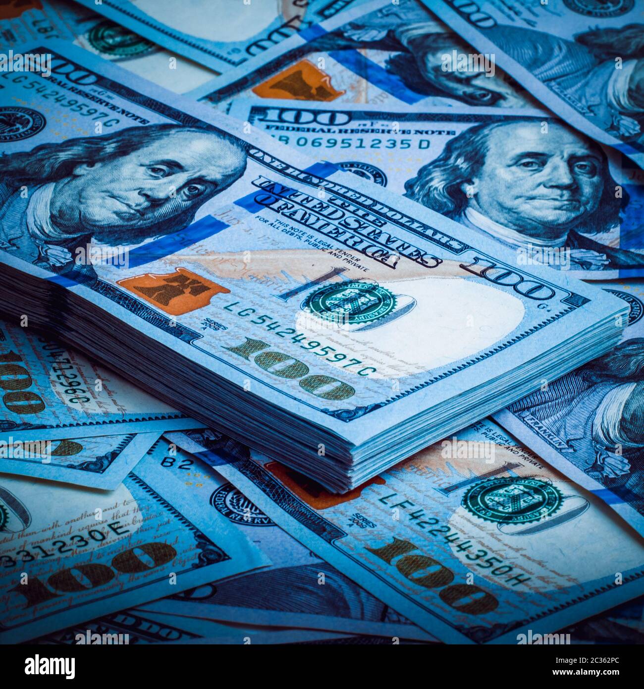 The background of a one hundred dollar bill. Style blue light Stock ...