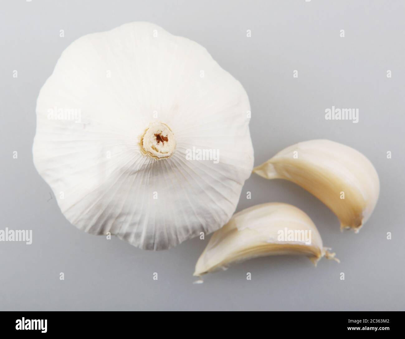 Close-Up Of Garlic Clove Against White Background Stock Photo - Alamy