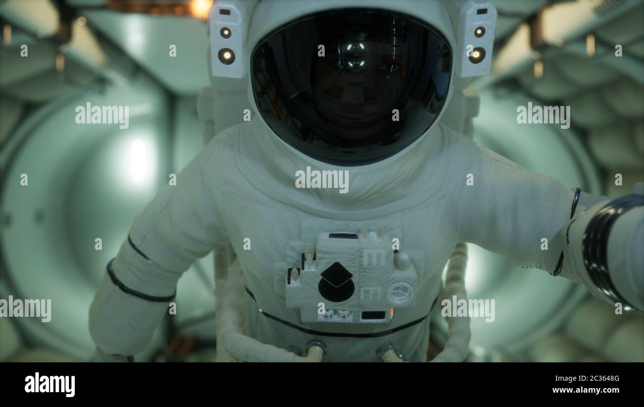 astronaut inside the orbital space station Stock Photo - Alamy