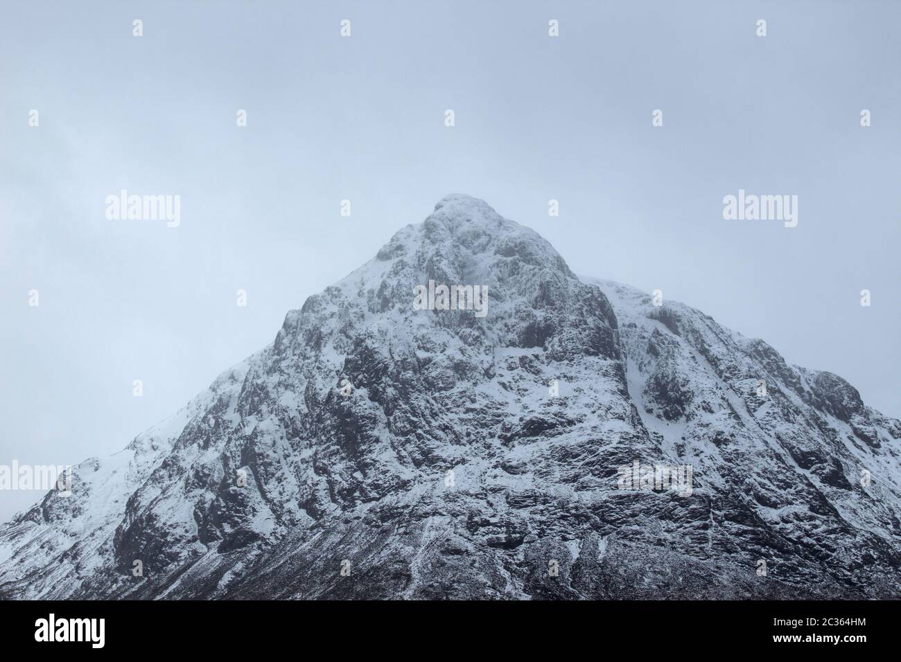 Highland’s snowy hills in the rain in Glencoe, Scotland Stock Photo - Alamy