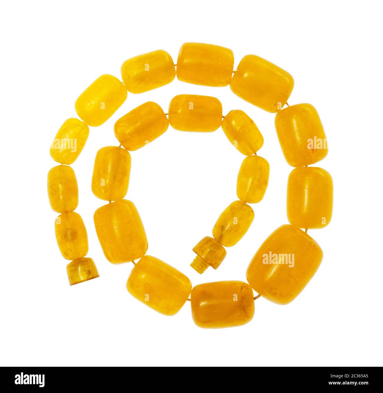 top view of spiral vintage necklace from yellow melted amber isolated ...