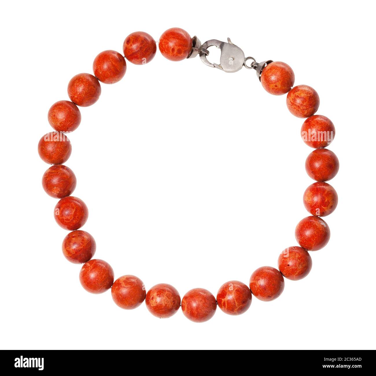 top view of necklace from polished red coral balls isolated on white ...