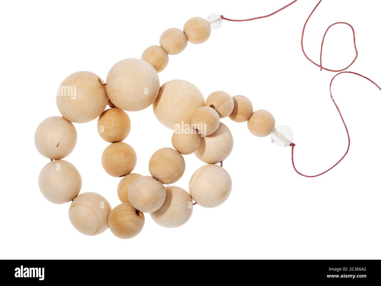 top view of tangled string of wooden beads isolated on white background ...