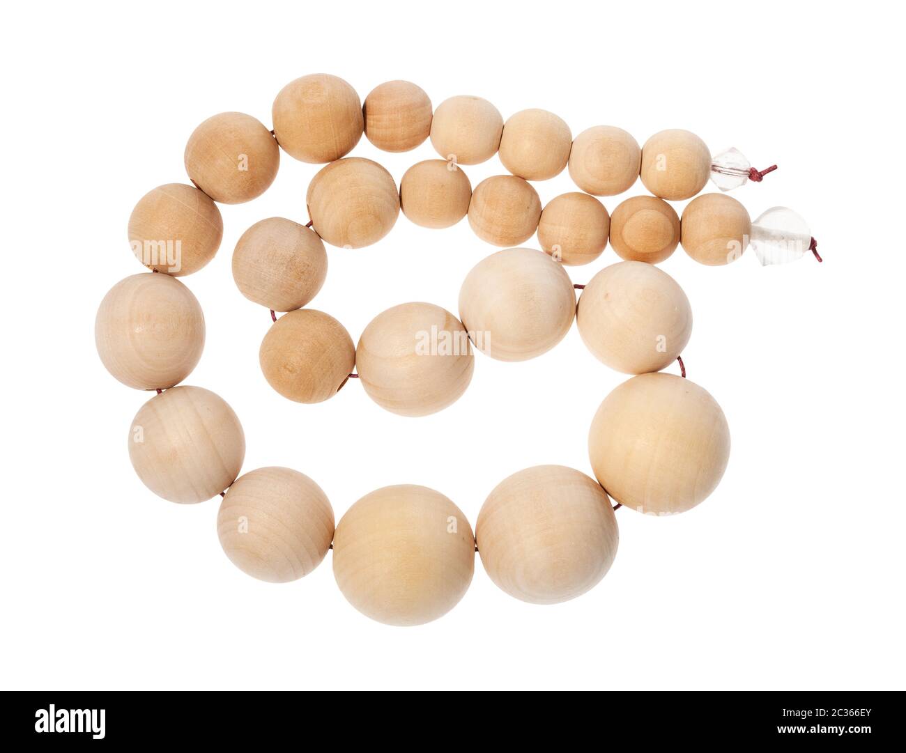 top view of coiled string of wooden beads isolated on white background ...