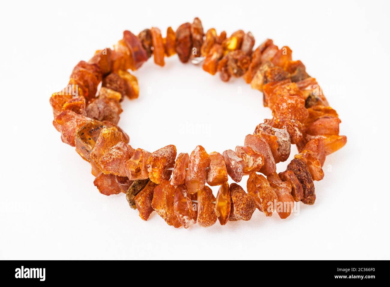 bracelet from natural rough amber nuggets on white paper background ...