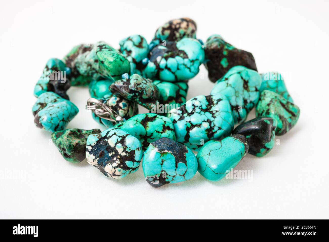 tangled string of beads from natural tumbled dyed howlite gemstone on ...