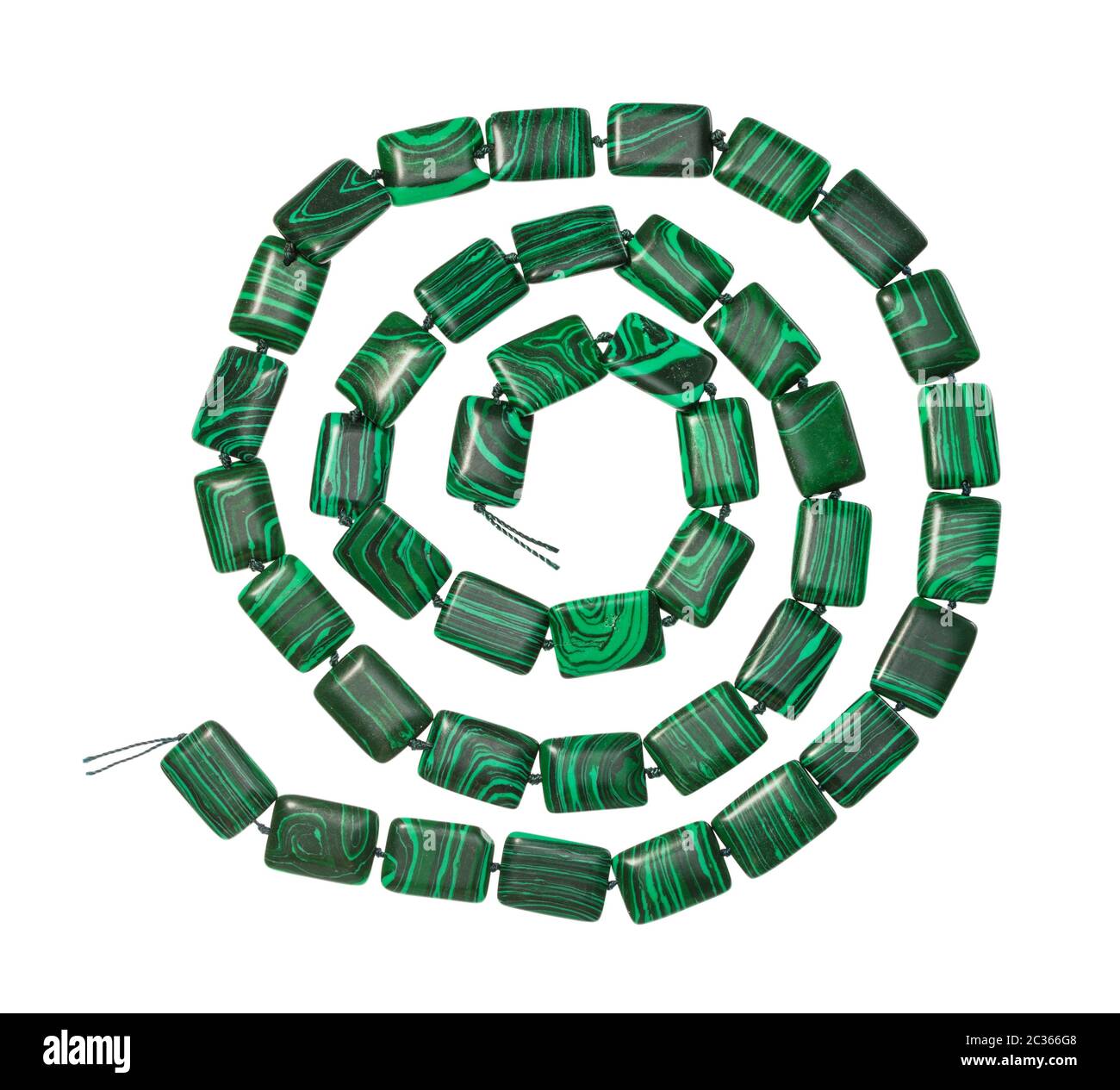 top view of spiral string of beads from artificial malachite isolated ...