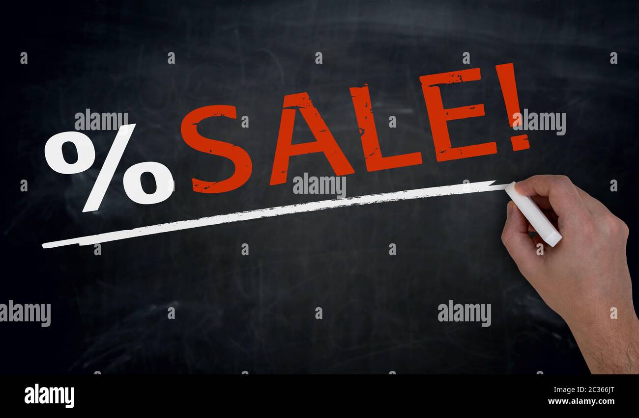Sale is written by hand on blackboard Stock Photo - Alamy