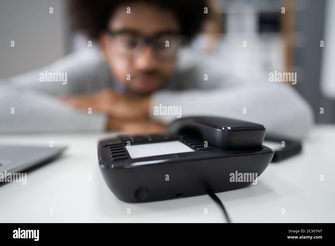 Man on telephone waiting landline hi-res stock photography and images ...