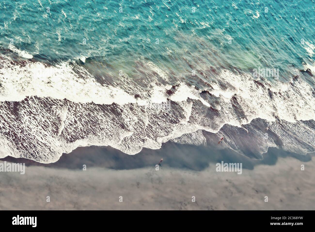 Top view from far above onto the Atlantic Ocean with bright blue-green ...