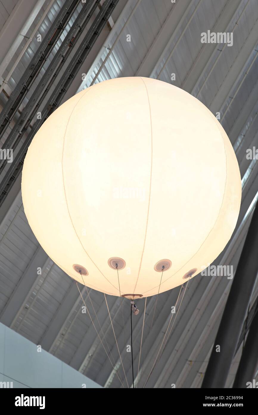 Big white advertising balloon in exhibition hall hi-res stock ...