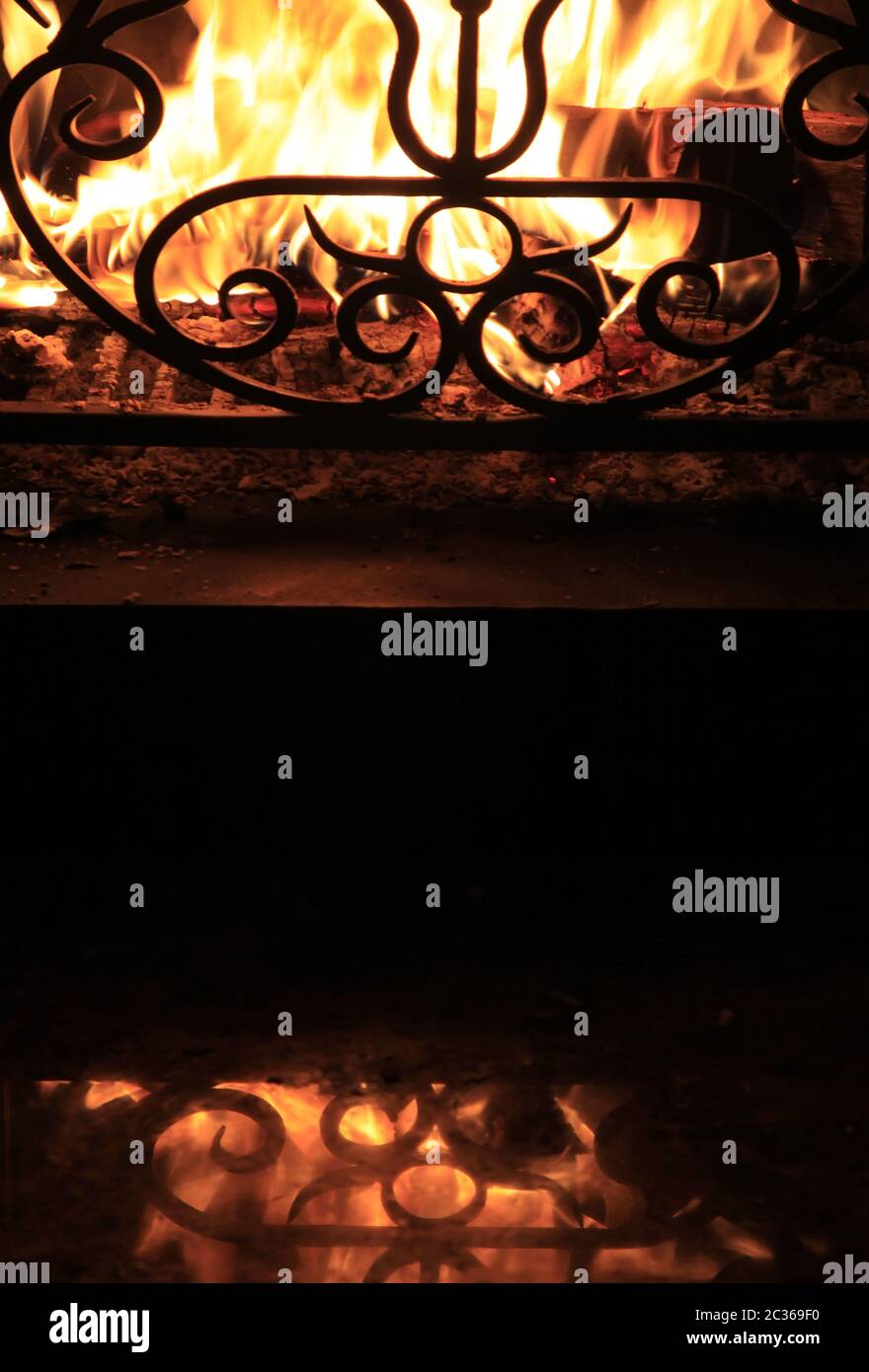Fire with sparks in a beautiful fireplace Stock Photo - Alamy
