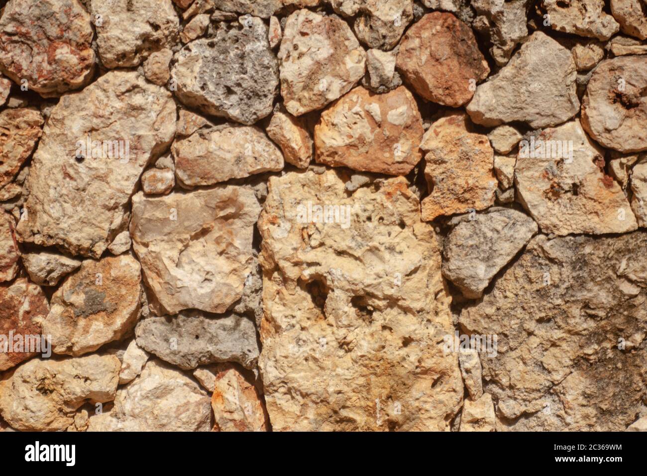 Wall textures with large stones put together to create a solid and ...