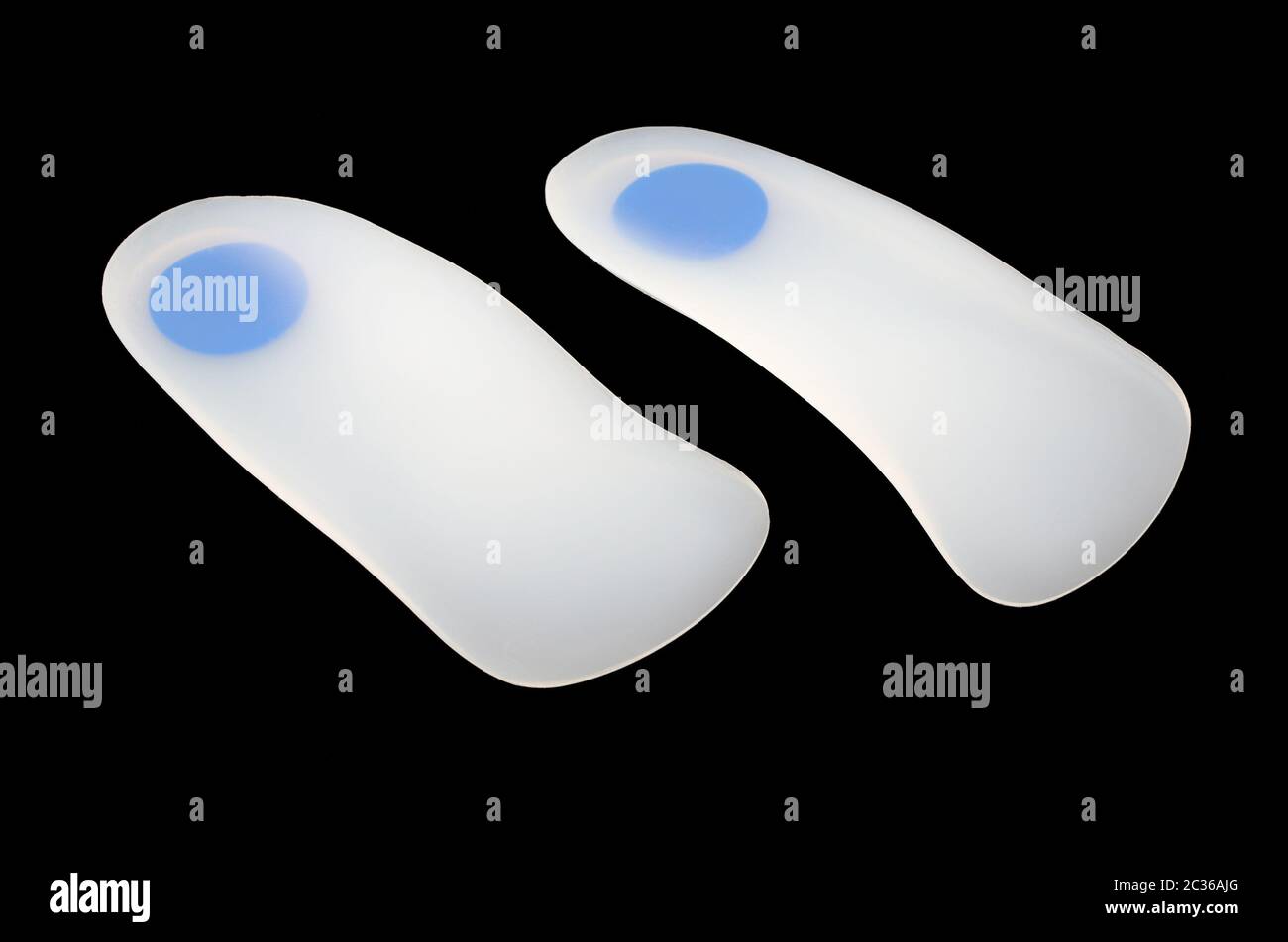 White orthopedic insole gel isolated on black background Stock Photo ...