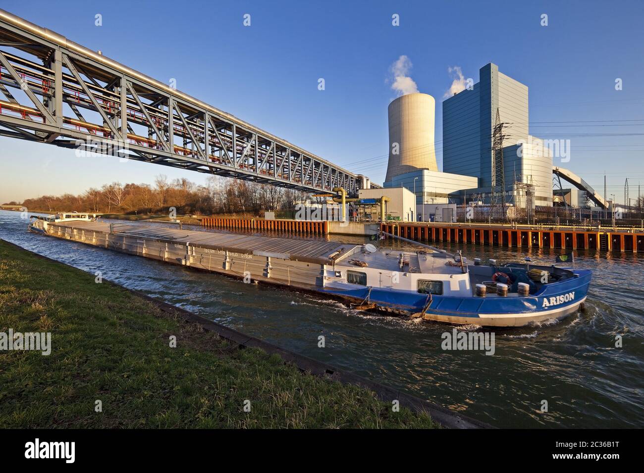 Coal-fired power plant Datteln 4 on the Datteln-Hamm Canal with cargo ...