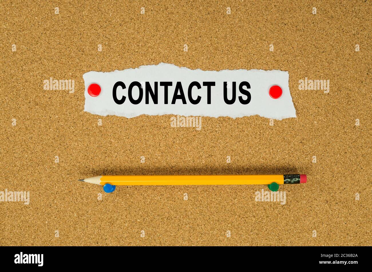 Contact us text note message pin on bulletin board Stock Photo - Alamy