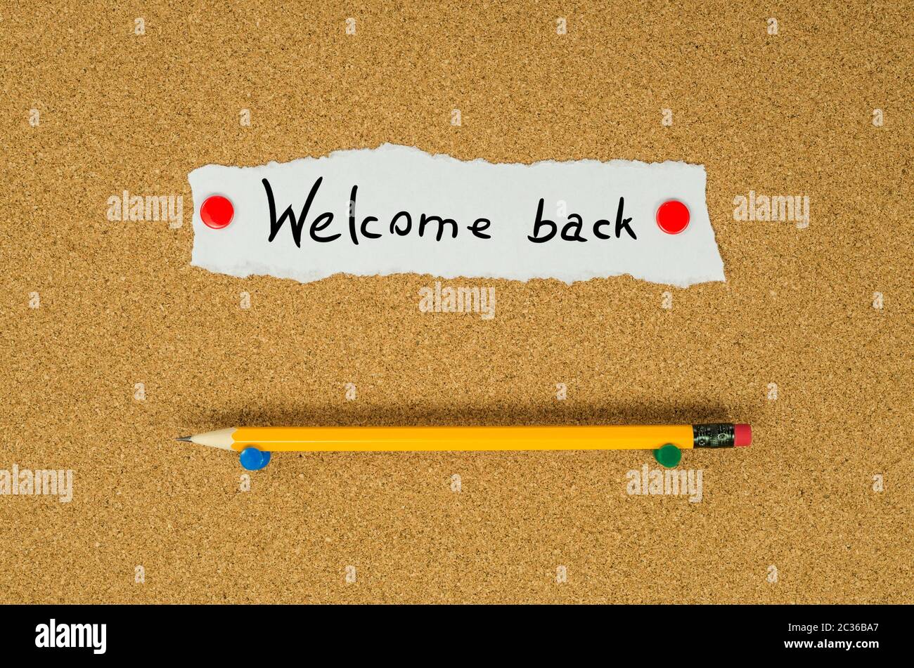 Welcome back text note message pin on bulletin board Stock Photo - Alamy