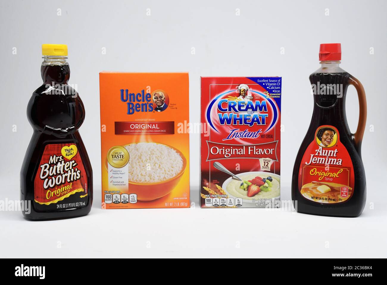 Containers (from left) of Mrs. Butterworth's original syrup 24 fl. oz ...