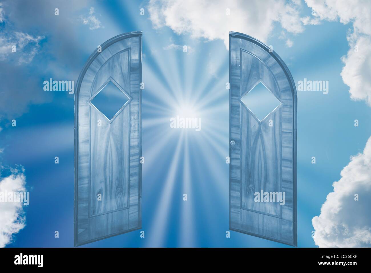Sun shining on sky through open door Stock Photo - Alamy
