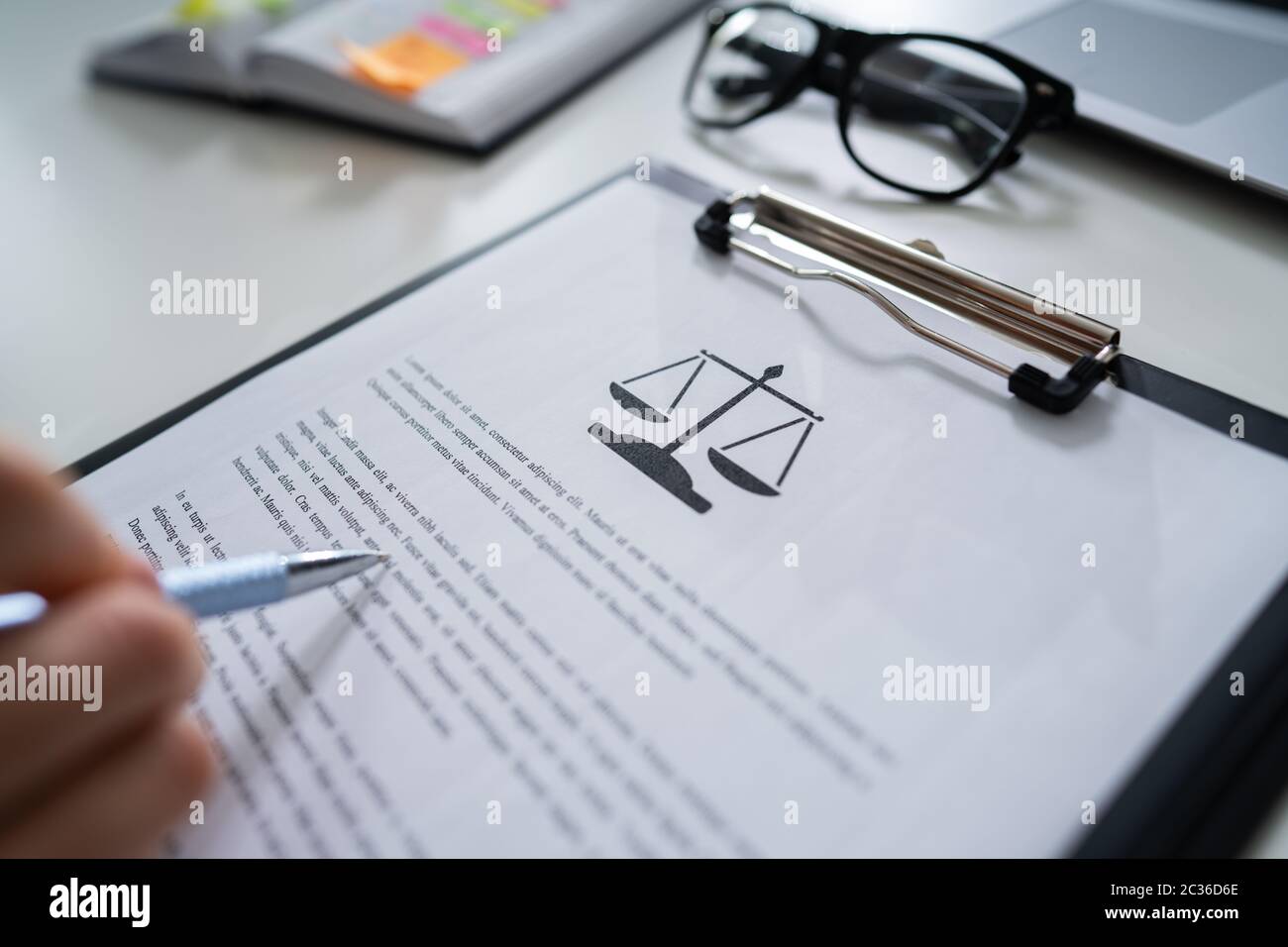 Close-up Photo Of Judge Reading Legal Document Stock Photo - Alamy