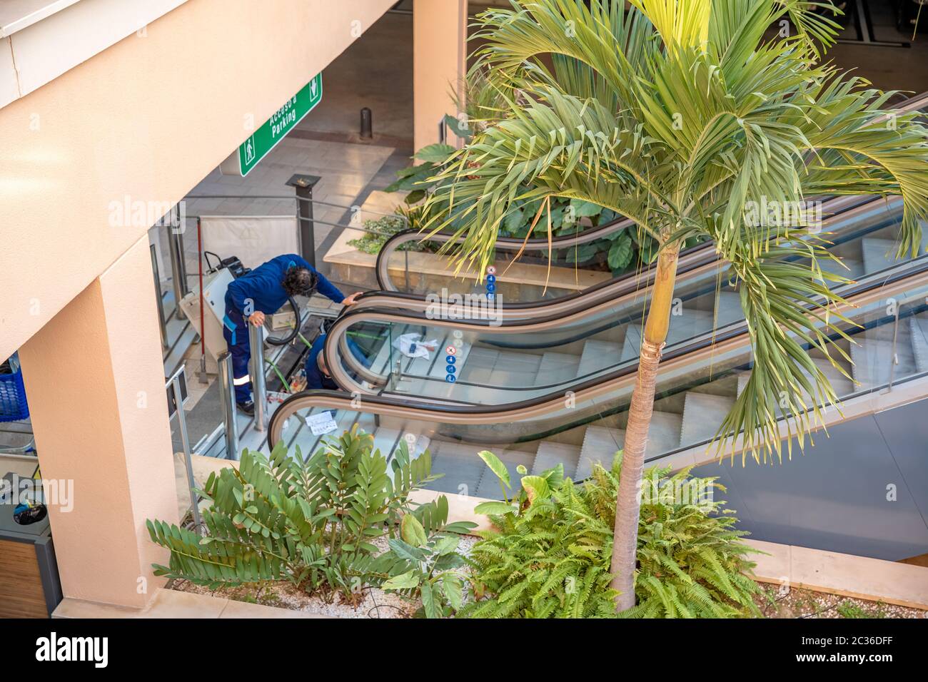 repair of escalators in shopping center Stock Photo - Alamy