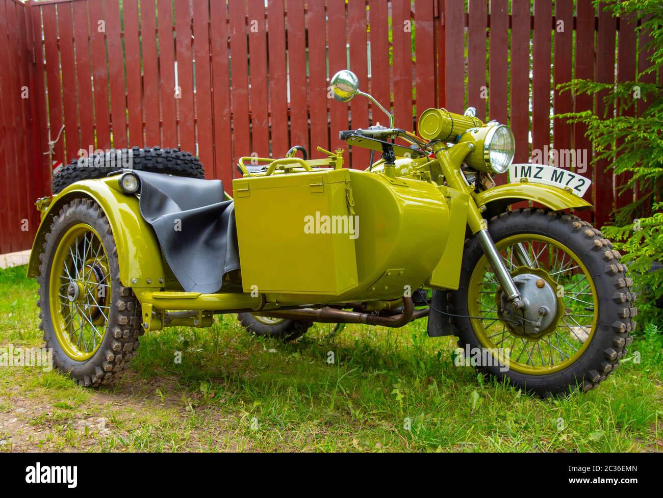 Restored bright green retro motorcycle with sidecar Stock Photo - Alamy