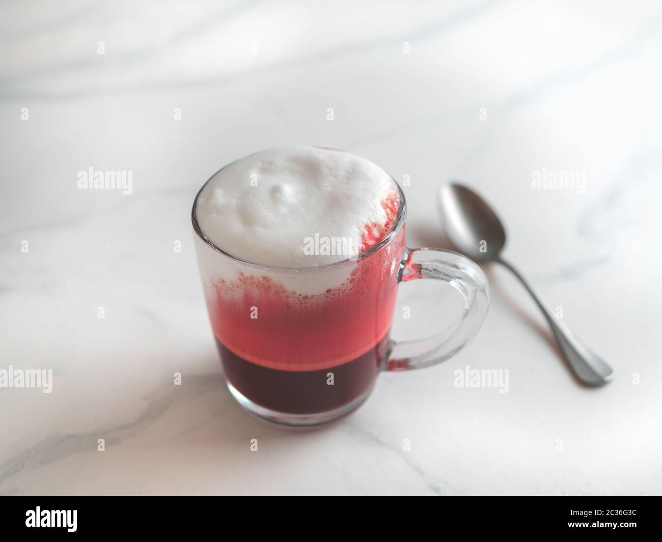 Pink beetroot latte or red velvet latte Stock Photo - Alamy
