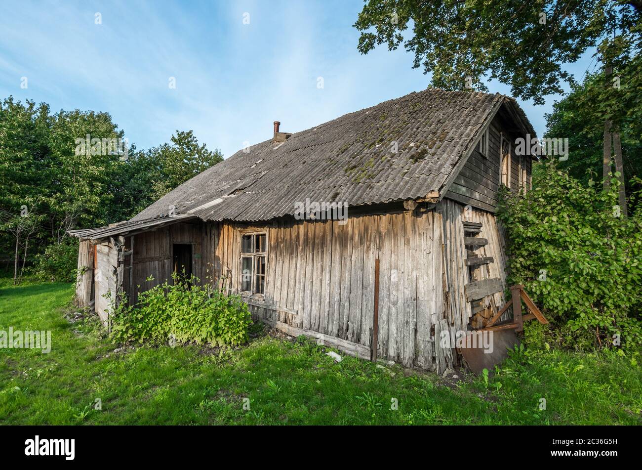 Old unoccupied and abandoned house stands in the outskirts Stock Photo ...