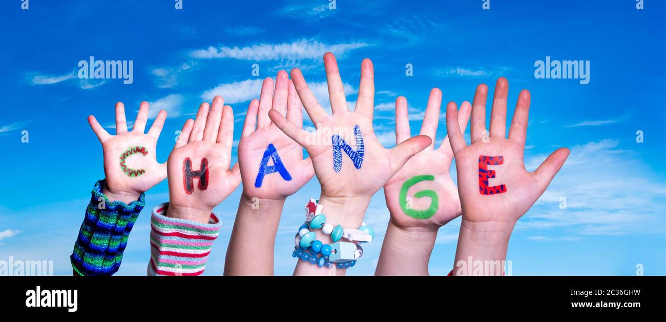 Children Hands Building Colorful Word Change. Blue Sky As Background ...