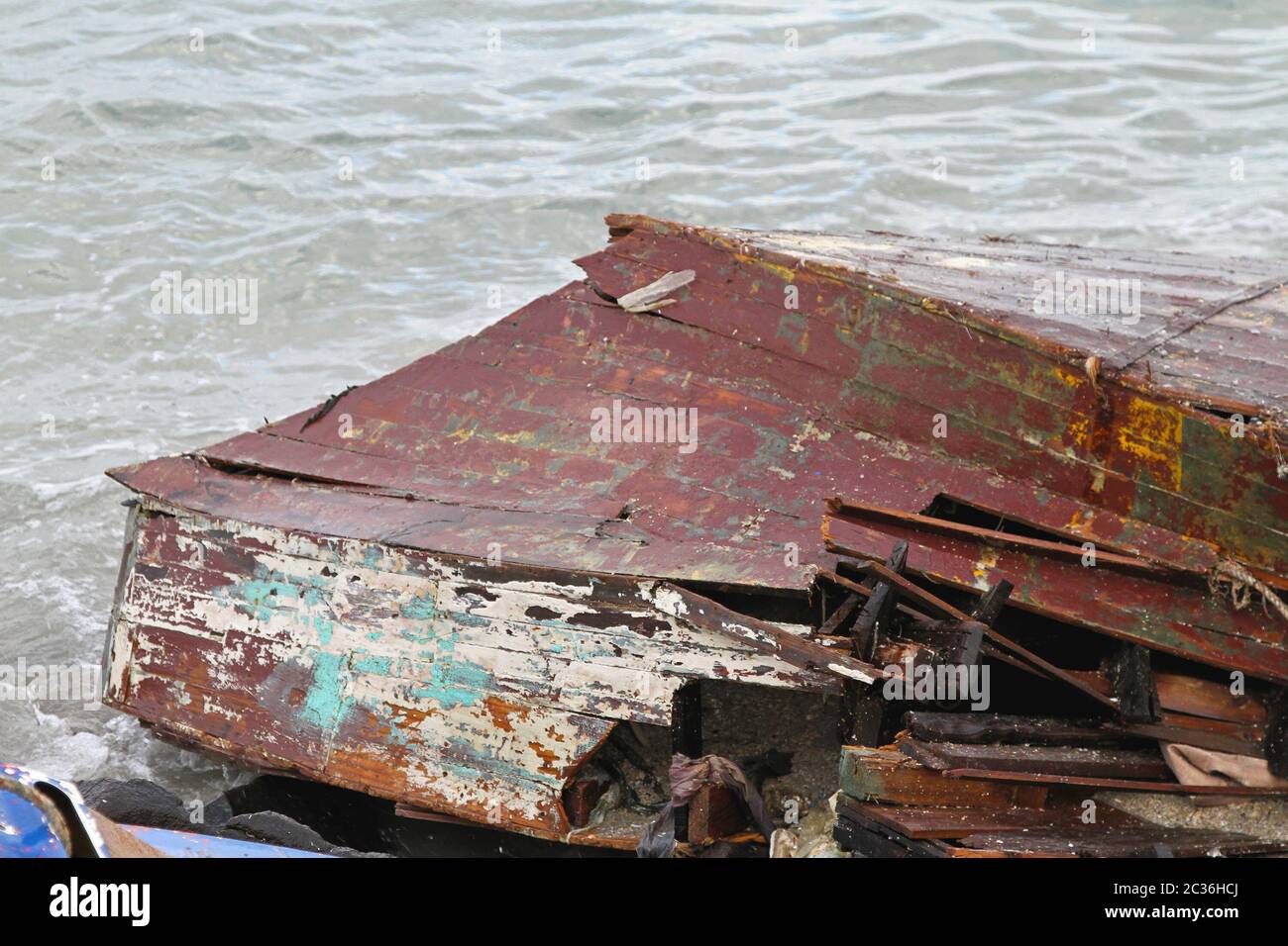 Boat wreck capsized debris after bad collision Stock Photo - Alamy