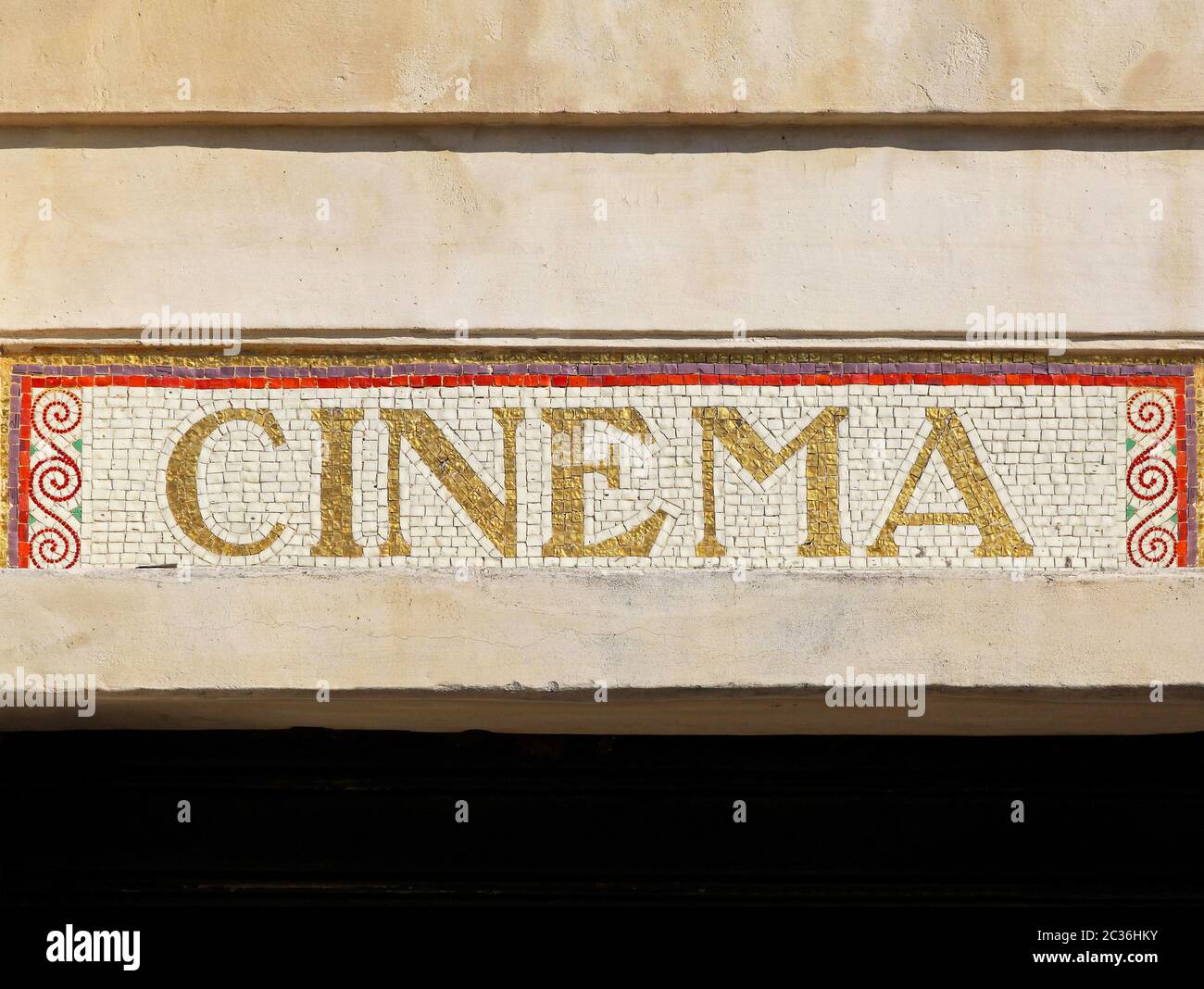 Old cinema sign made from stone mosaic Stock Photo - Alamy