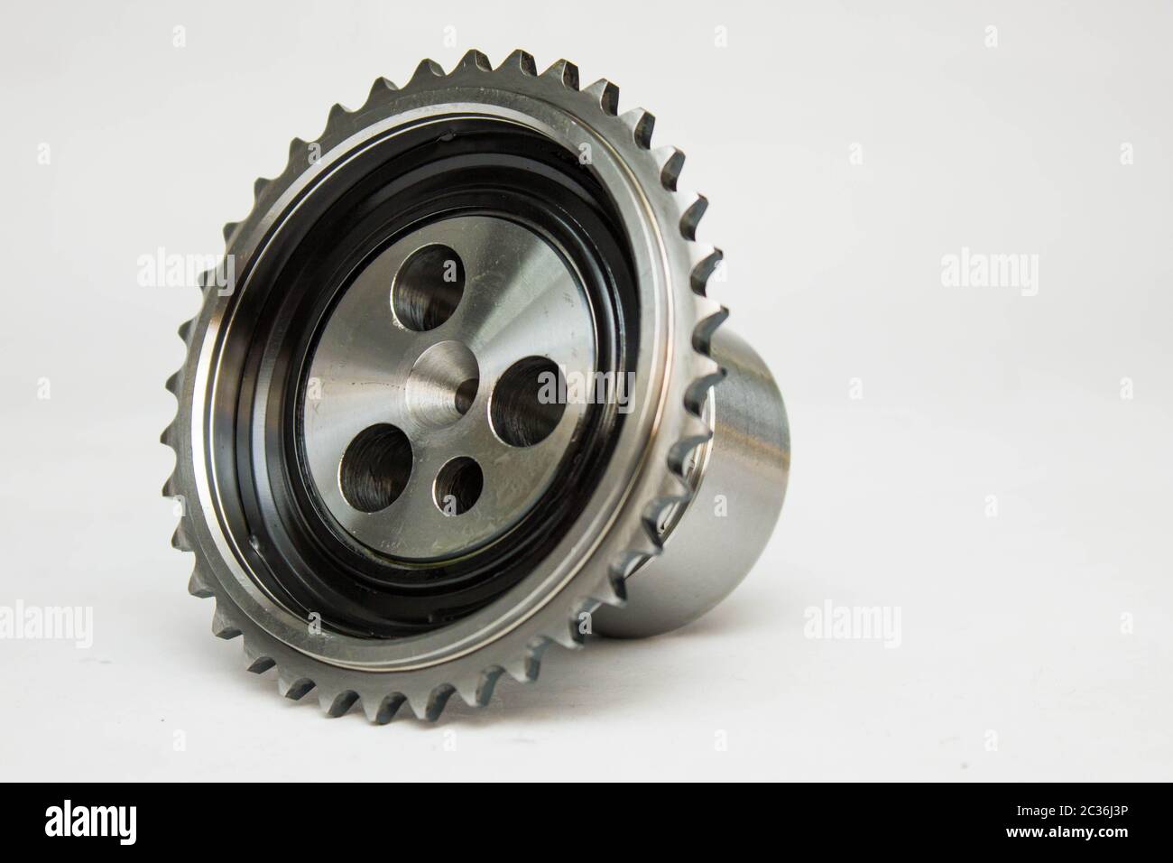 New details on a gray background. The camshaft gears Stock Photo - Alamy