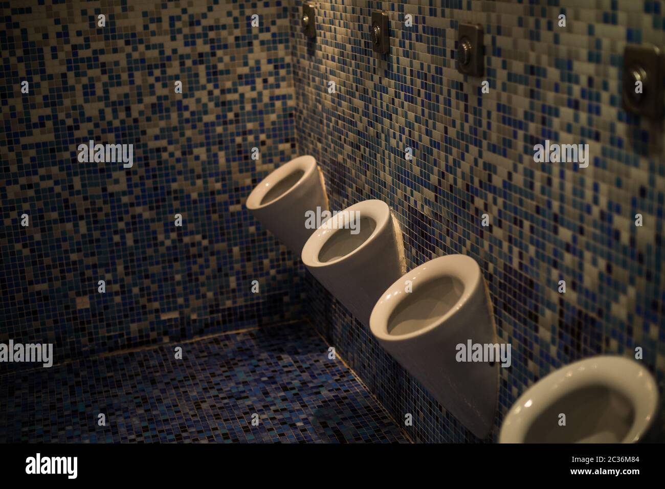 Color image of a men's public toilet Stock Photo - Alamy