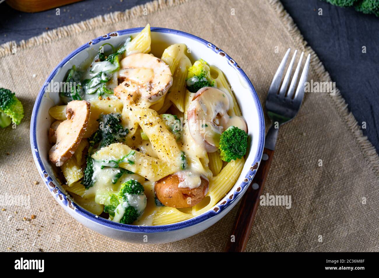Real pasta with mushrooms, spinach and broccoli Stock Photo - Alamy