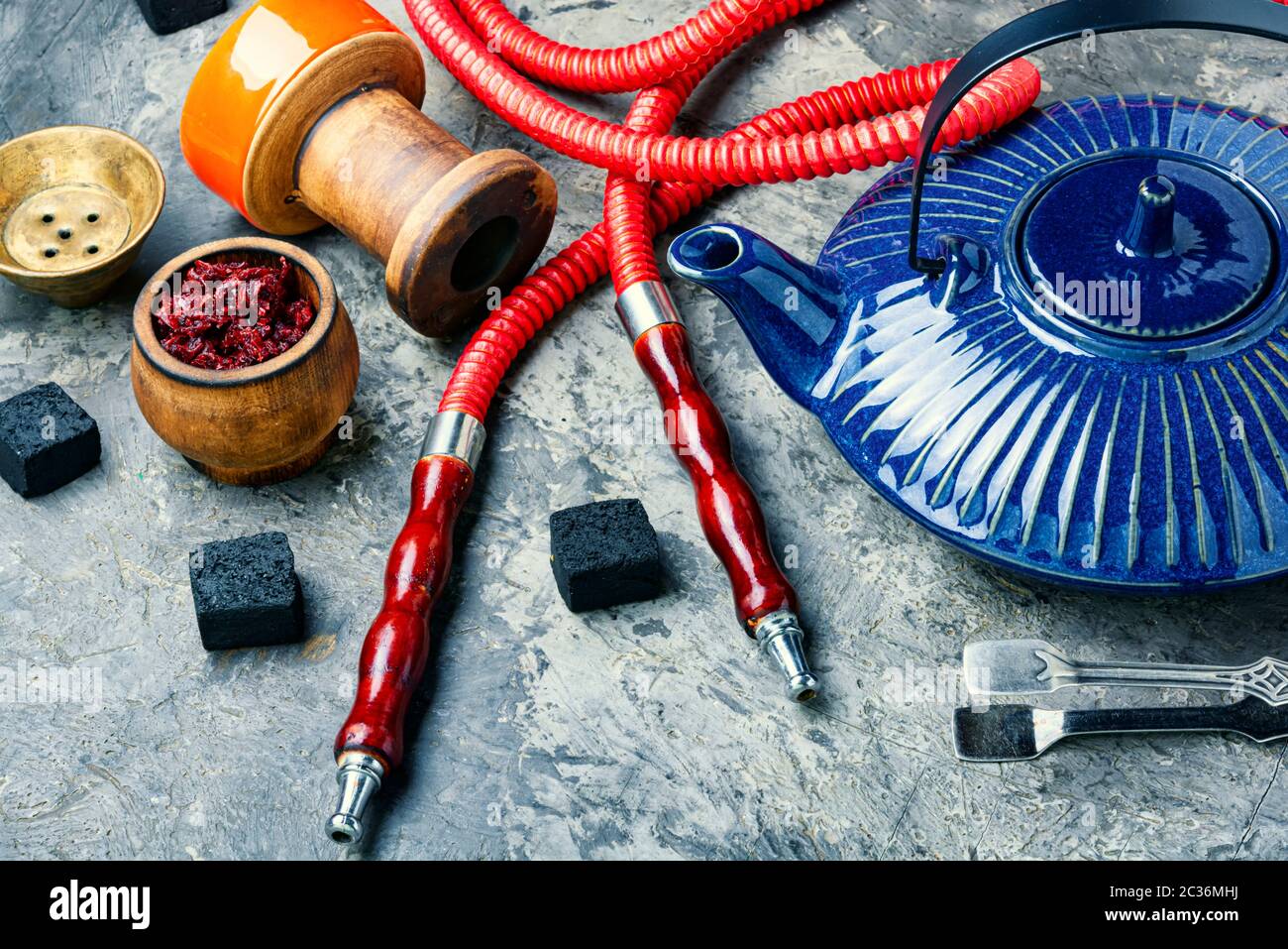 Details of tobacco hookah and teapot with tea.Egyptian smoking shisha ...